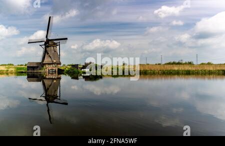 A view of a historic 18-century windmill at Kinderdijk in South Holland ...