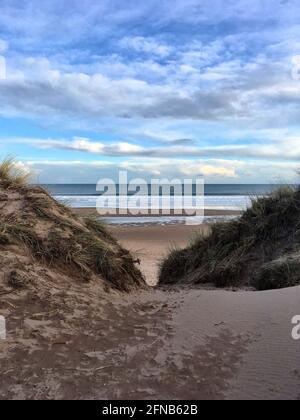 rock peaking out of water Stock Photo - Alamy