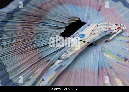 A pile of one thousand Philippines banknotes. Cash of Thousand dollar ...