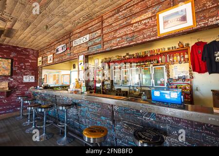 Bar counter of the iconic Blue Heeler Hotel with its writings on the ...