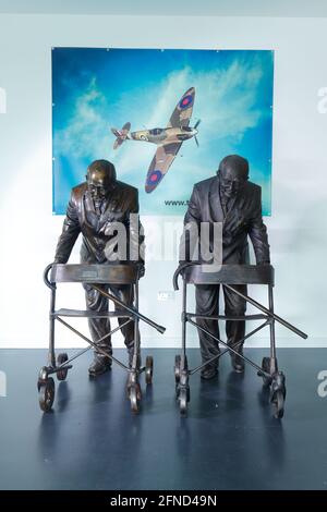 A resin and bronze statue of the late Sir Captain Tom Moore on display ...