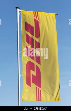 DHL, flag with logo, parcel and letter express service, North Rhine ...
