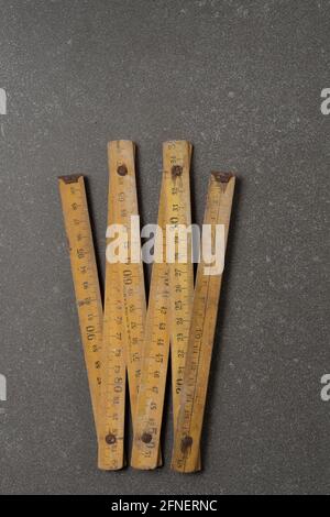 Carpenter folding ruler. Wooden unfolded ruler with metrical scale ...