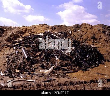 A mountain of waste at a landfill site in Thailand with a natural ...