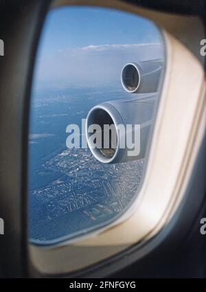 Airbus A340, view out of the window with engine and wing Stock Photo ...