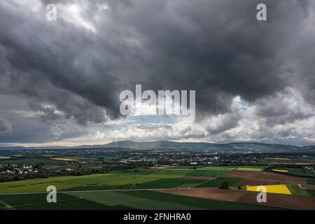 Nieder Erlenbach, Germany. 17th May, 2021. Dark storm and thunder ...