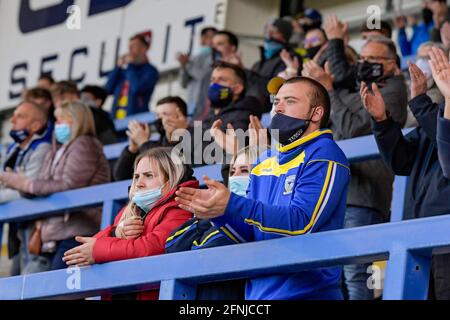 Warrington Wolves fans applaud there team Stock Photo - Alamy
