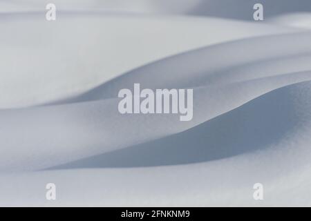 Snow shapes in Alaska. Light and shadows Stock Photo - Alamy