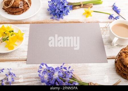 Oatmeal cookies with spring snowdrop flowers bluebells, narcissus and ...