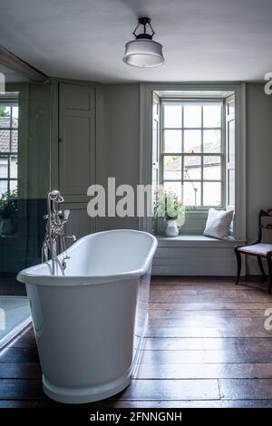 Freestanding bath in restored Jacobean Wool Merchant's house, Somerset ...