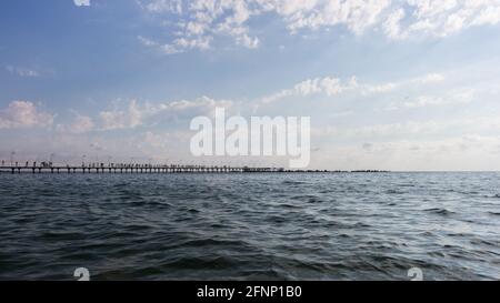 Wavy blue ocean gleaming under the blue sky Stock Photo - Alamy