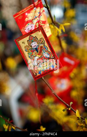 Red envelopes ( hongbao ) on yellow tree for Chinese and Vietnamese New ...