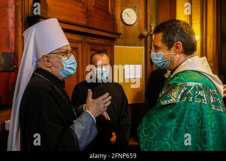 Orthodox and catholic priests and bishop in the sacristy of Saint ...