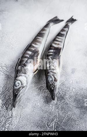 Raw icefish on a kitchen table. White background. Top view Stock Photo ...