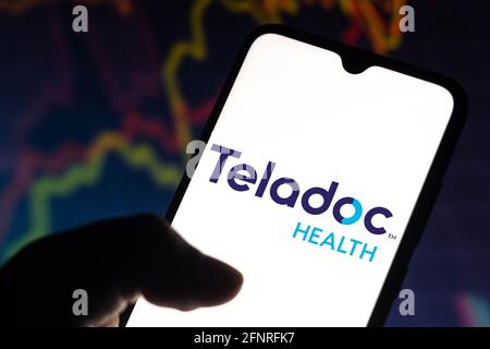 In this photo illustration, the Teladoc Health logo seen displayed on a ...