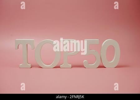 Top 50 word alphabet letters on pink background Stock Photo - Alamy