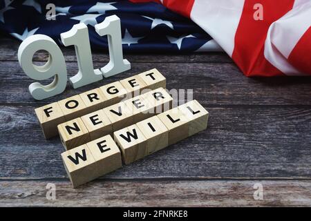 911 We will Never Forget Word with USA flag on wooden background Stock ...