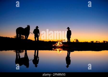 Drovers on Horseback at sunset, Anna Creek Cattle Station. South ...