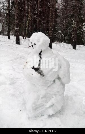 Sissy-snowman (peasants buxom wife) makes his way through the snow ...
