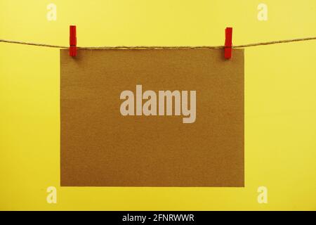 empty space copy paper hang with wooden clip and rope on wooden boards ...