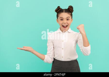Happy tween give yes gesture showing open hand. Back to school sale ...