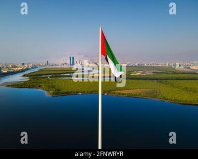 UAE national flag pole and Ras al Khaimah emirate in the northern ...