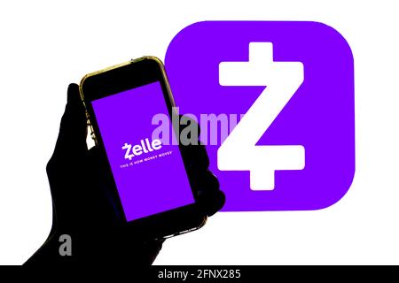 In this photo illustration a Zelle app seen displayed on a smartphone ...