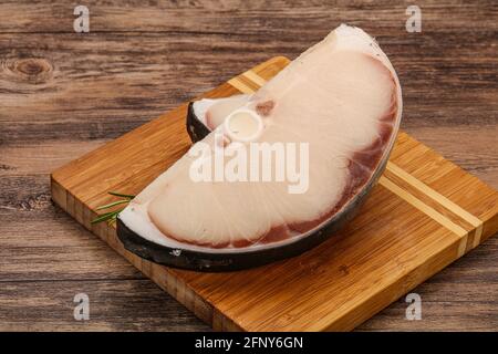 Raw shark steak served rosemary for cooking Stock Photo - Alamy