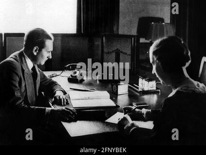 Secretary Taking Dictation From Boss In office 1980's Stock Photo - Alamy