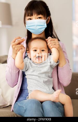 Japanese parent with female child while medical exam at hospital ...