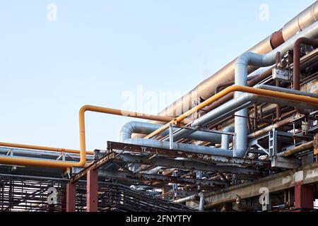 Tangle of pipes. Concept of complexity of petrochemical industry ...