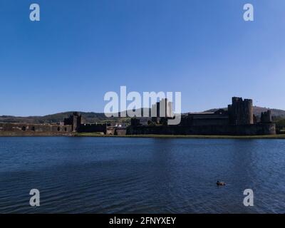 Visitors walking on the moat wall in front of the South East tower of ...