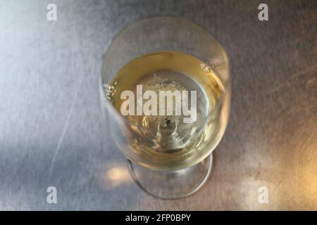 tartrate crystals in a glass of white wine Stock Photo - Alamy