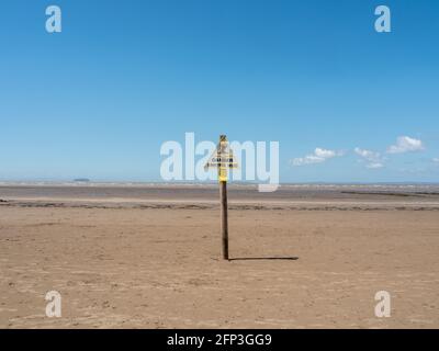 Danger Sinking Mud warning sign on the beach at Weston-Super-Mare in ...