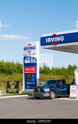 Sign for an Irving gas station in Nova Scotia, Canada. The filling ...