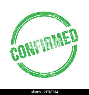 CONFIRMED text on green grungy round vintage stamp Stock Photo - Alamy