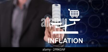 Man touching an inflation concept on a touch screen with his finger ...