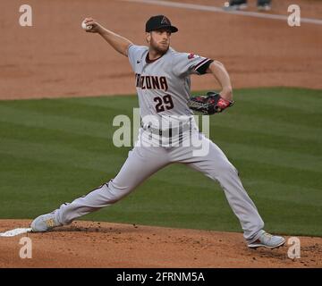 Arizona Diamondbacks starting pitcher Merrill Kelly delivers during the ...