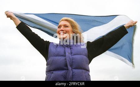 Ali Paton also known as Siren from the TV show Gladiators holds aloft ...