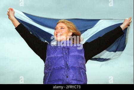 Ali Paton also known as Siren from the TV show Gladiators holds aloft ...