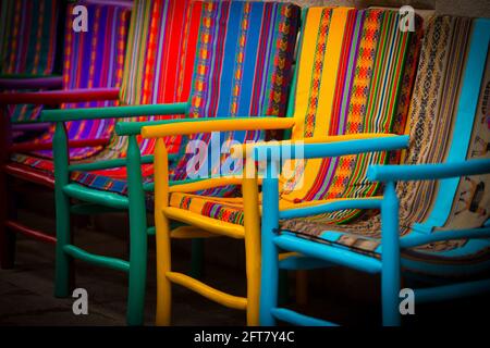 Handmade Colorful Peruvian Chairs in a Row Stock Photo - Alamy