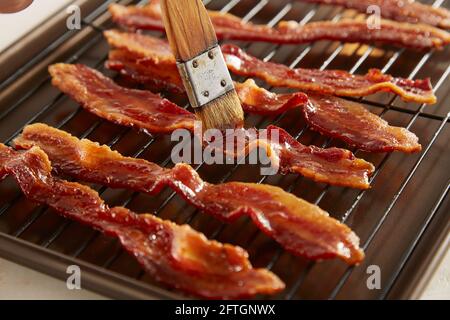 Maple syrup glazed bacon Stock Photo - Alamy