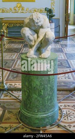 Crouching Boy sculpture by Michelangelo Buonarroti Stock Photo - Alamy