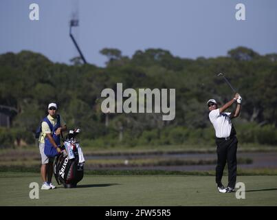 Hideki Matsuyama of Japan watches his approach shot on the fourth green ...