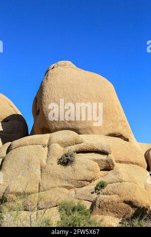 A huge mound of rocks called "Skull rock" resembling a human skull at ...