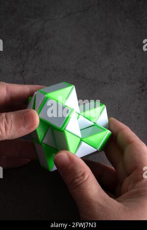 Fidget toy snake heart shape Stock Photo - Alamy