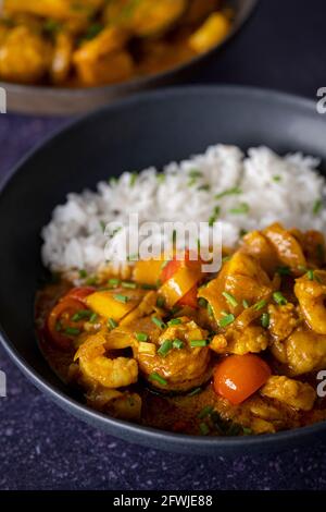 Monkfish and prawns curry Stock Photo - Alamy