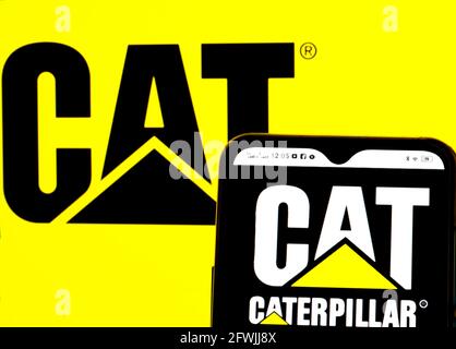 In this photo illustration, the Caterpillar logo is seen displayed on a ...