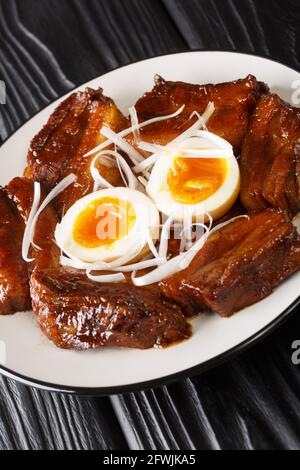 Delicious Pork Belly Served on a Bed of Vegetables With a Refreshing ...