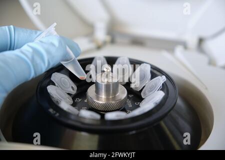 Small tube to machine in laboratory Stock Photo - Alamy